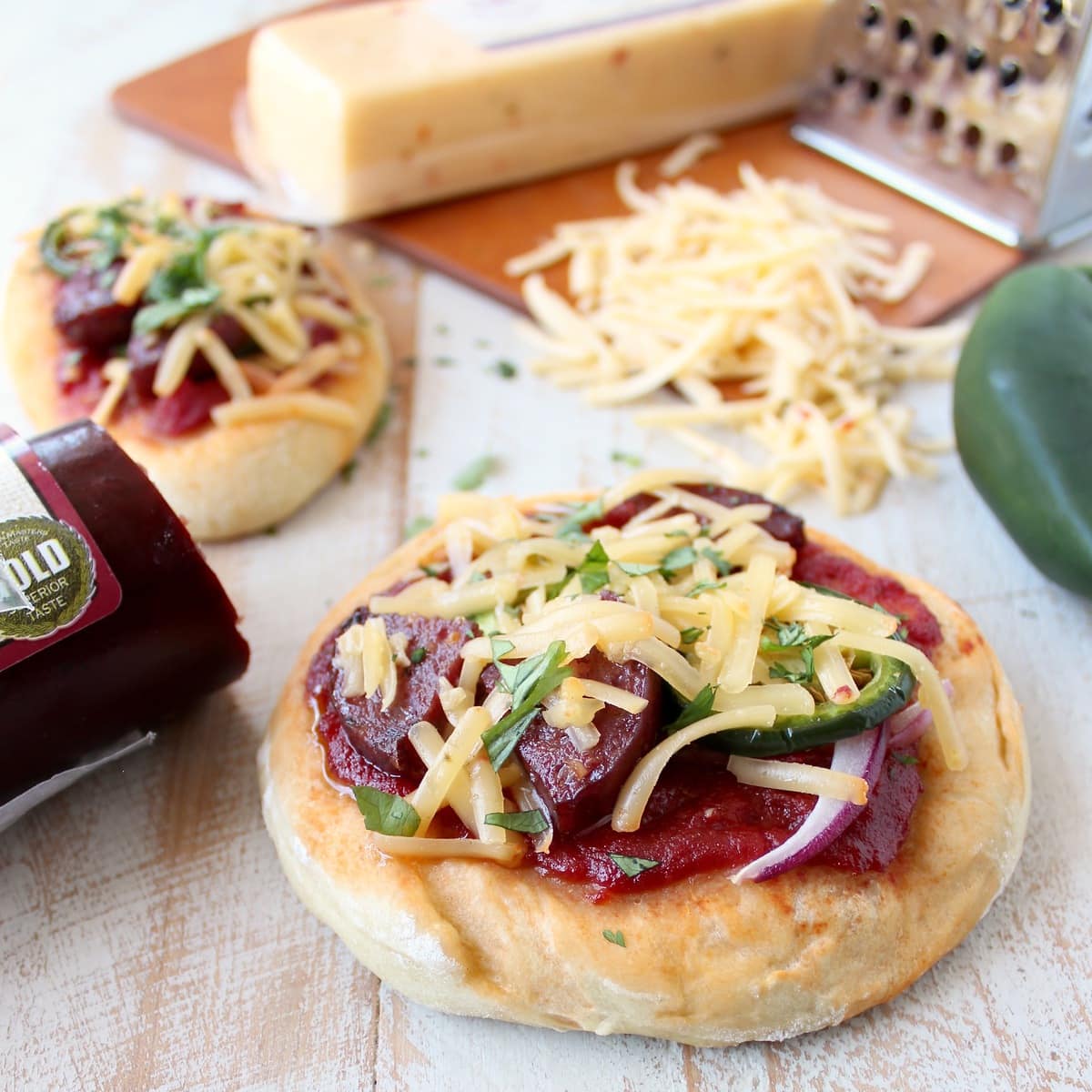 Spicy Sausage Mini Pizza Recipe - WhitneyBond.com